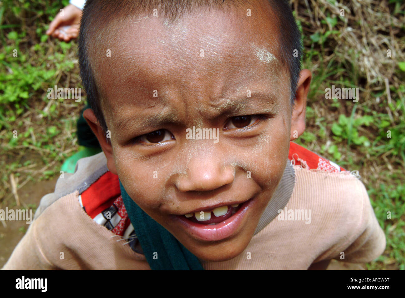 Young Burmese boy near Inle lake Stock Photo - Alamy