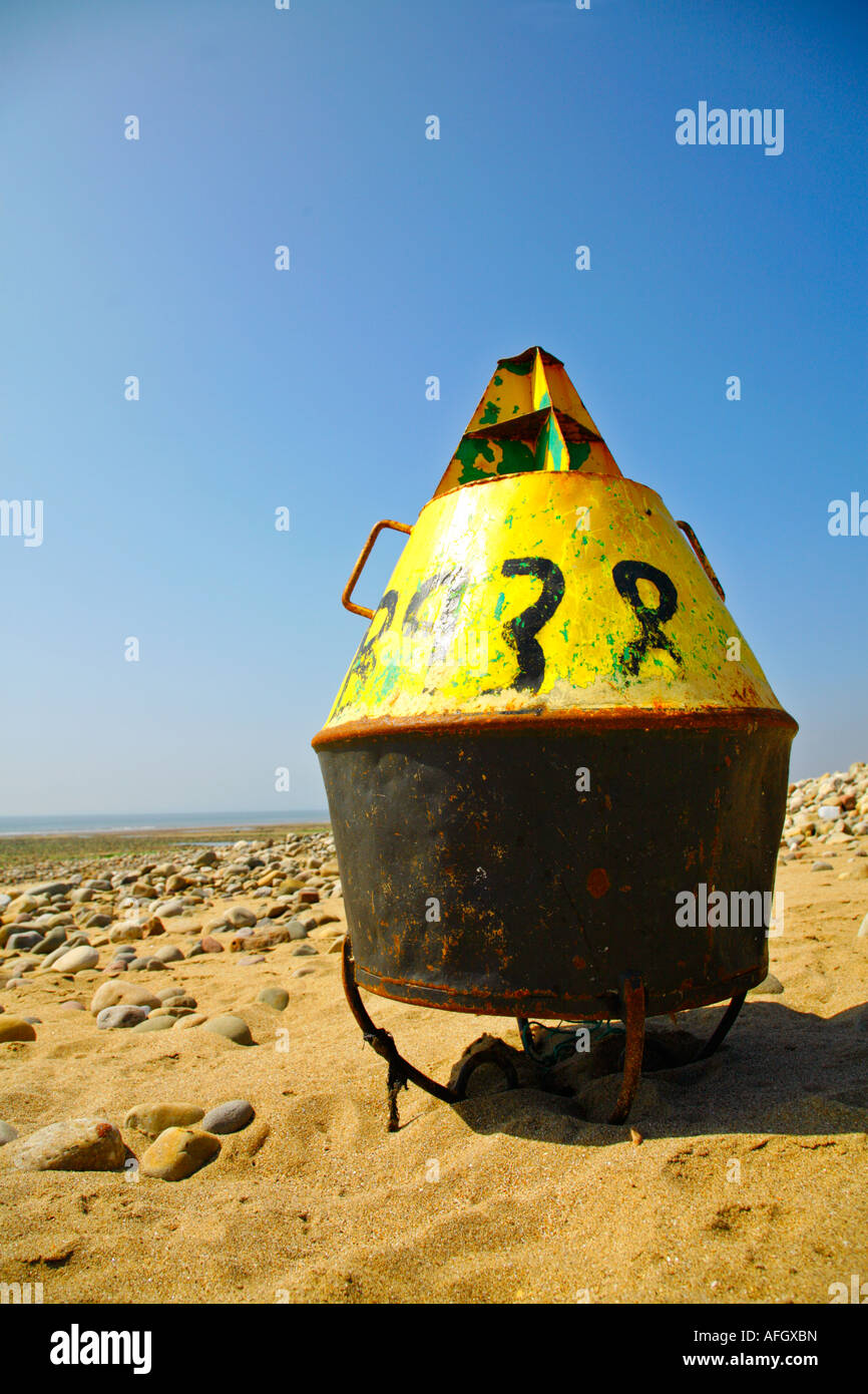 Buouy on a beach Stock Photo - Alamy