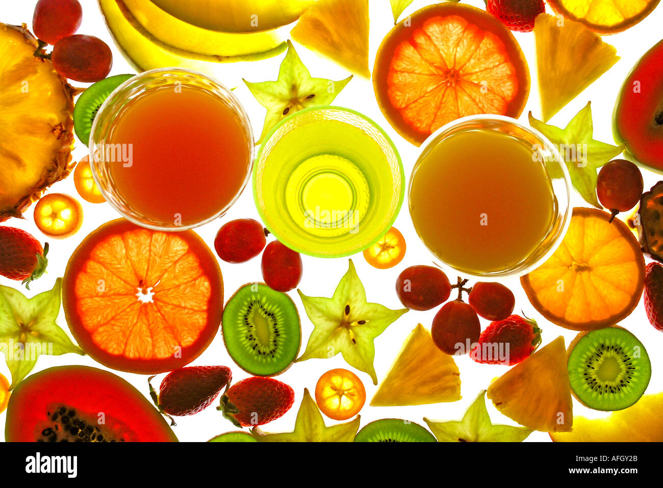 Sliced fruits and juice Stock Photo - Alamy