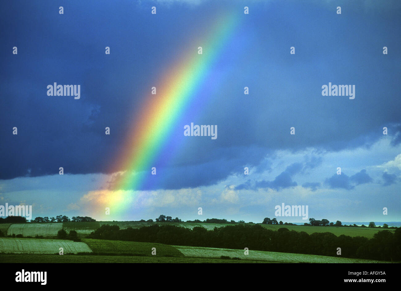 Rainbow over fields North Dorset England UK Europe Stock Photo - Alamy