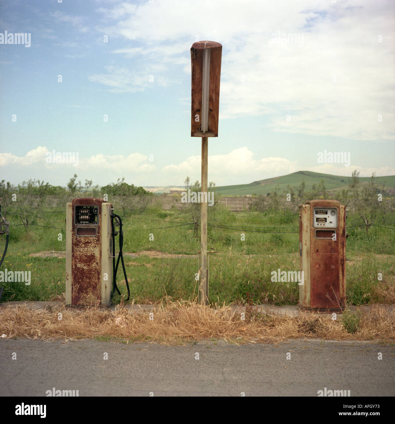 old and ruined petrol pump gas station in a rural field Stock Photo - Alamy