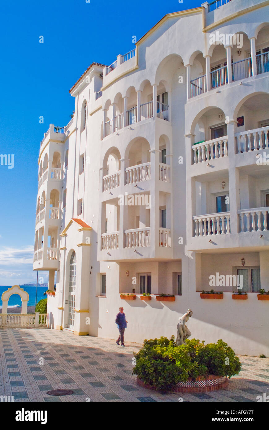 Multi story condos near beach in Nerja Spain Stock Photo - Alamy