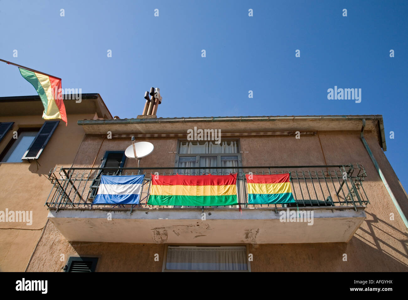 Italian flag on balcony in Porto Santo Stefano Monte Argentario Tuscany ...