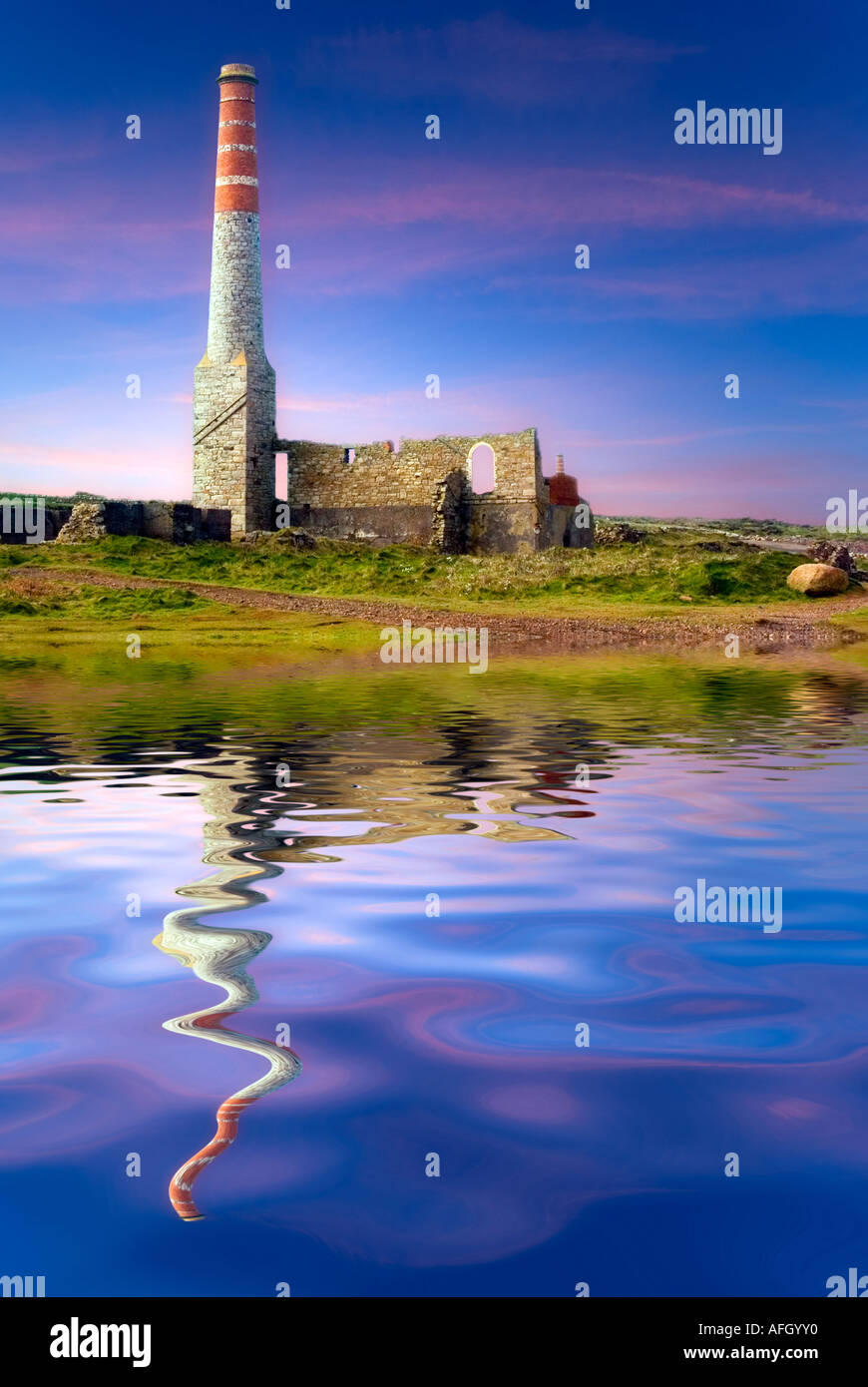 Old Cornish tin mine reflected in water Stock Photo - Alamy