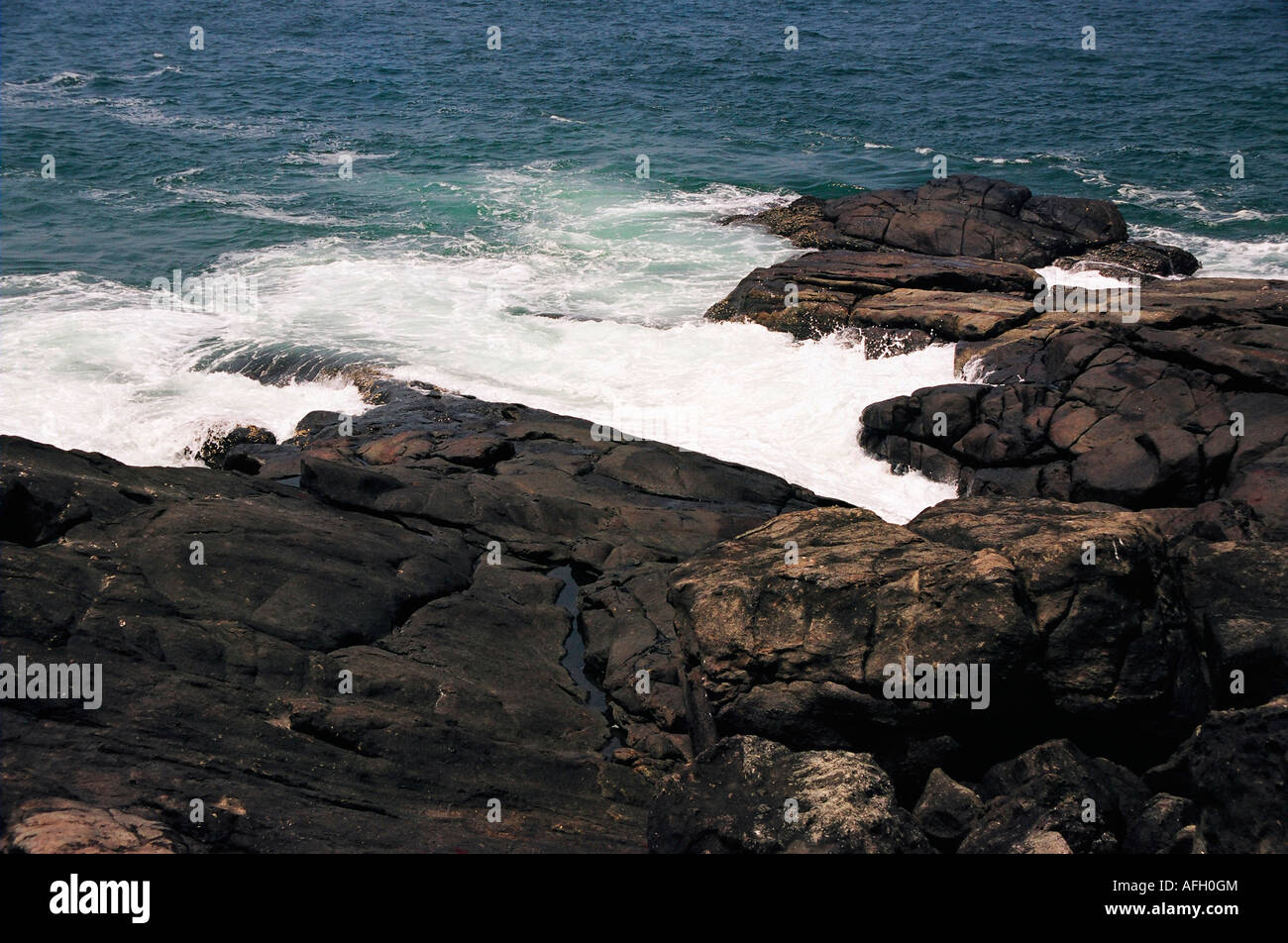 "splashing wave" "waves rock" rock waves Stock Photo - Alamy