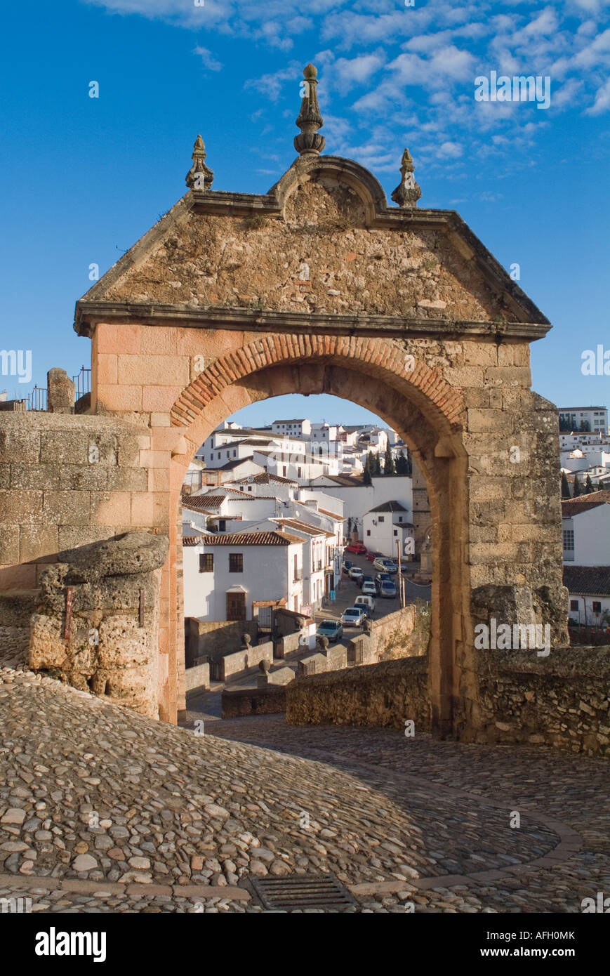 Arch of Philip V Roman bridge and walkway in Ronda Spain Stock Photo ...