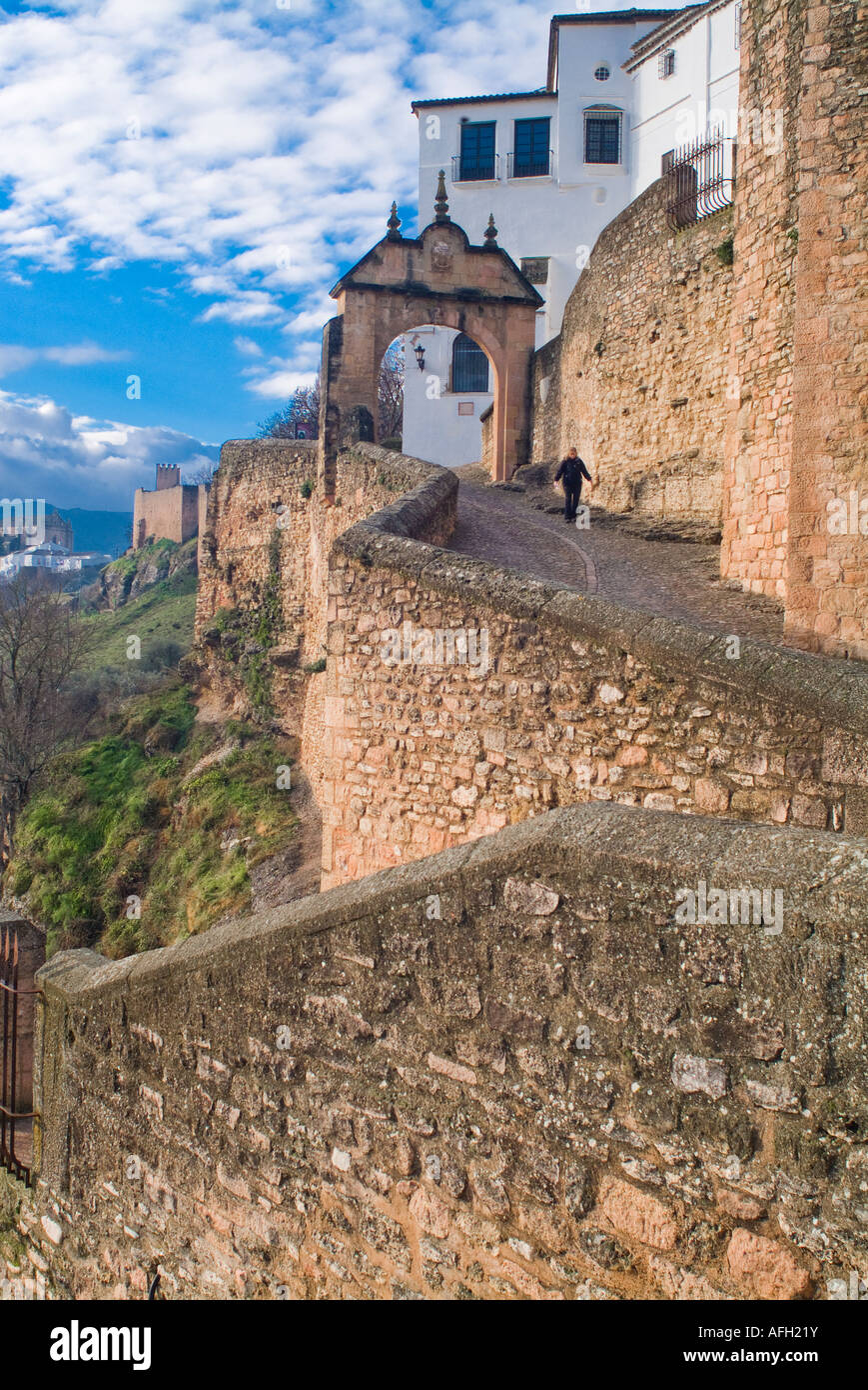 Arch of Philip V Roman bridge and walkway in Ronda Spain Stock Photo ...