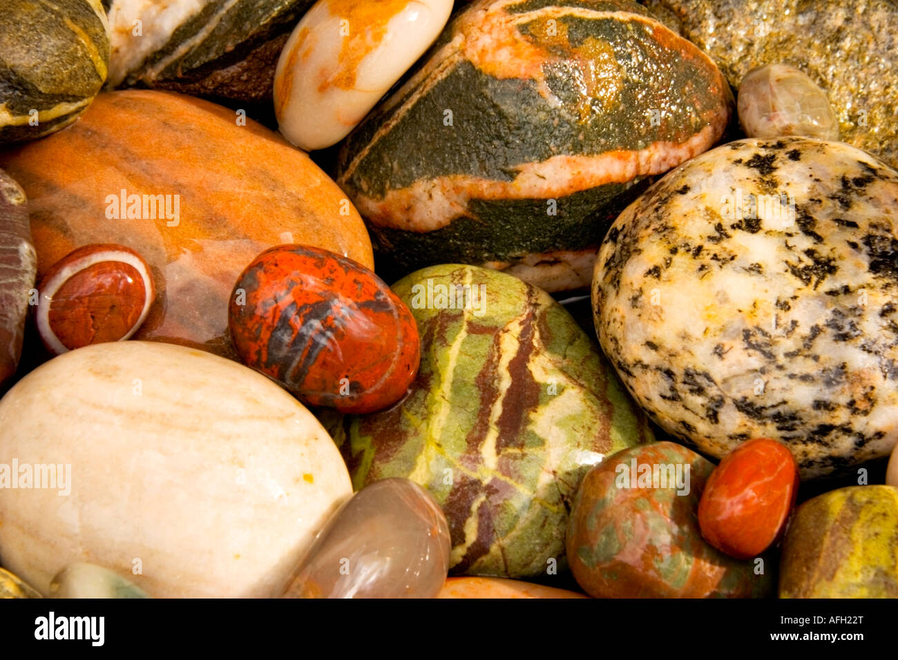 Coloured pebbles from the beach Stock Photo - Alamy