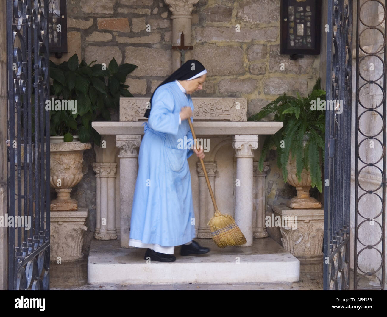 Nun cleaning hi-res stock photography and images - Alamy