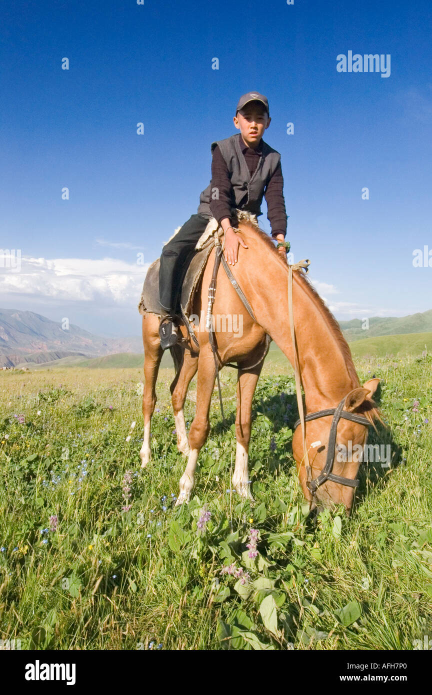 Kirgis boy sitting on a horse, Kyrgyzstan Stock Photo - Alamy
