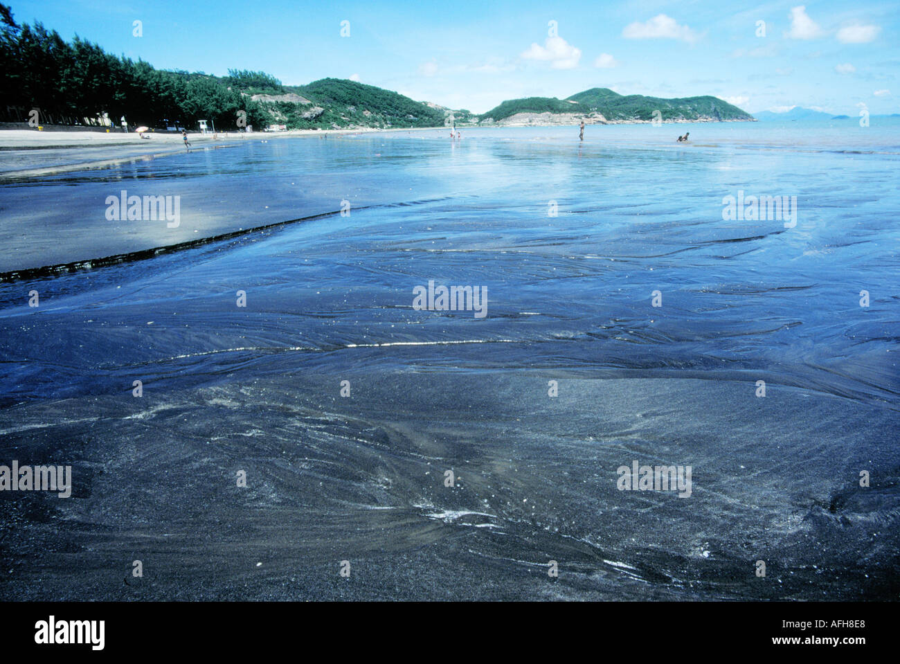 China Macau Black Sand beach Stock Photo - Alamy