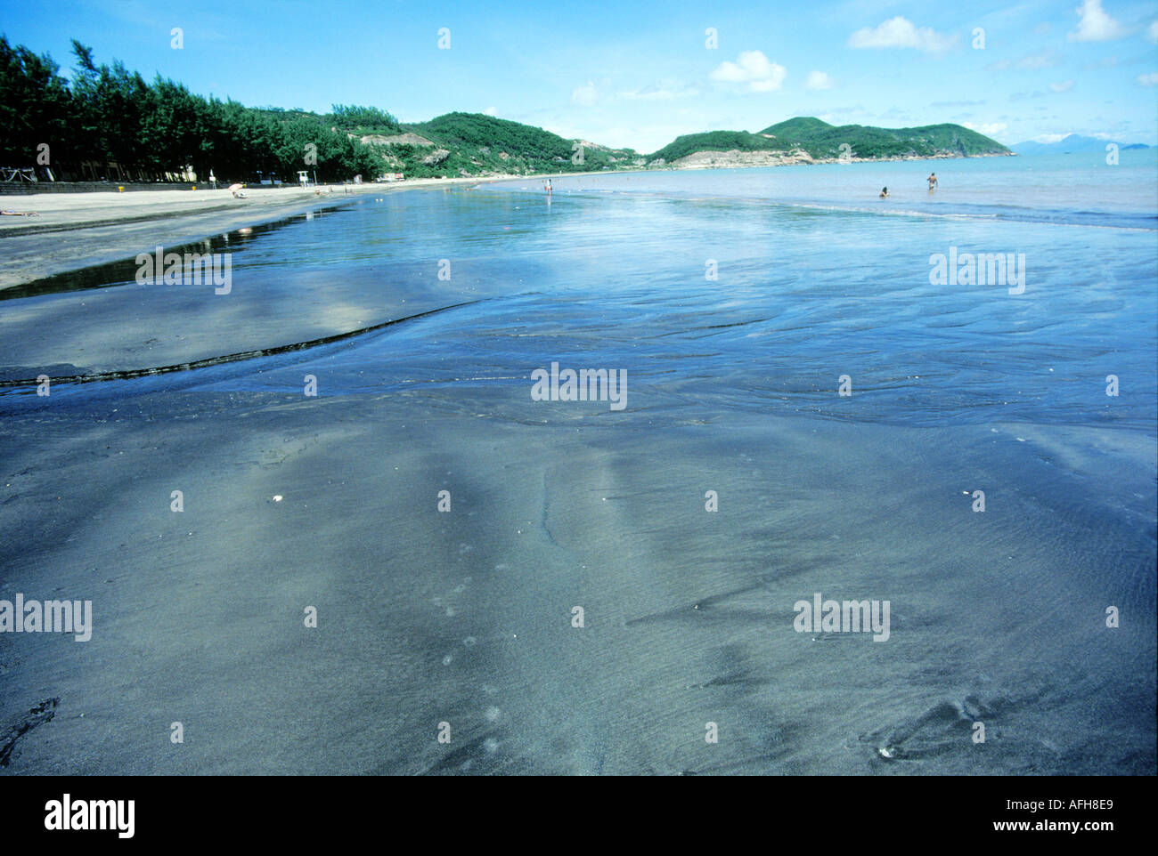 China Macau Black Sand beach Stock Photo - Alamy