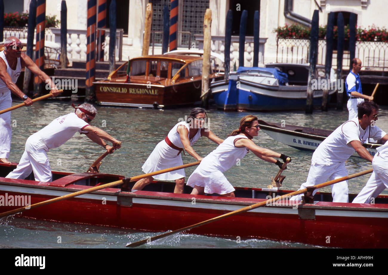 Stand up Rowers in Regatta on Grand Canal Venice Italy Stock Photo - Alamy