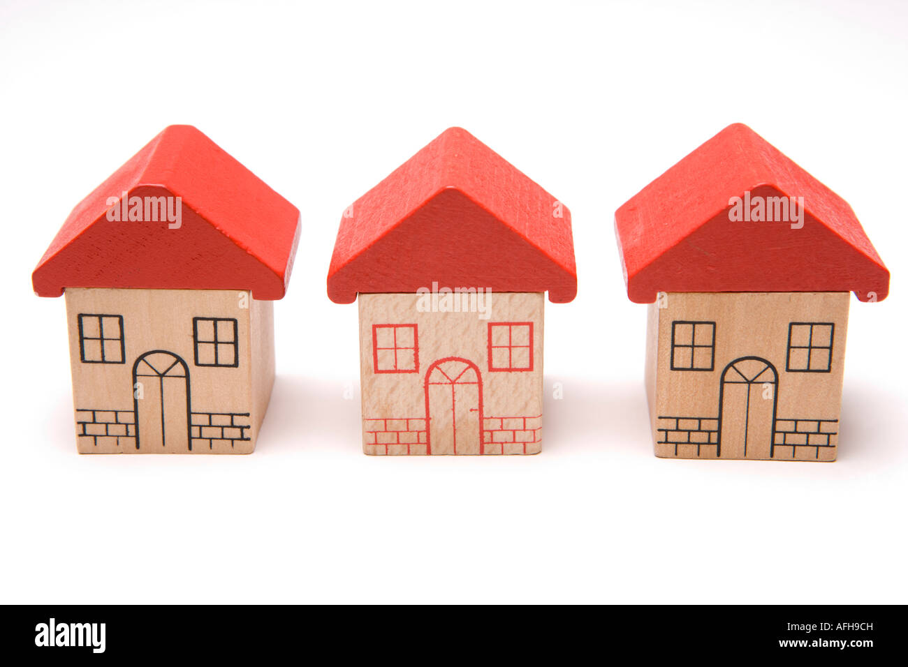 Housing row of three houses with the middle property a different ...