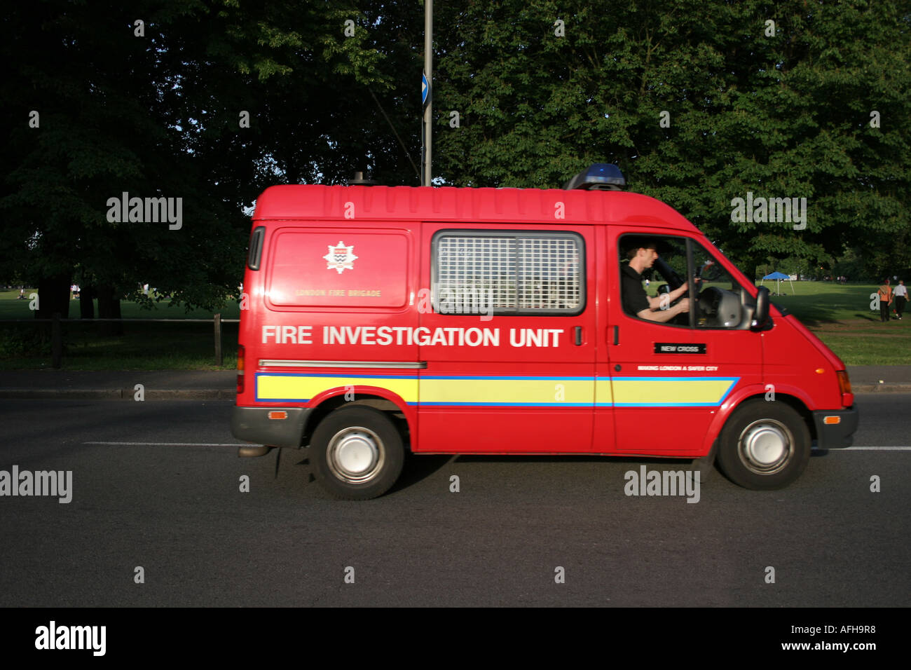 Fire engine rushing Stock Photo - Alamy