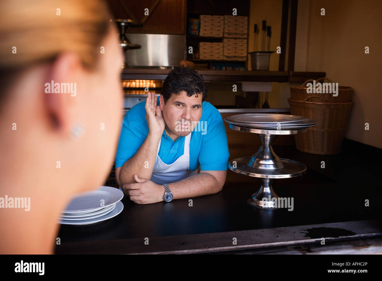 Chef interacting with customer Stock Photo - Alamy