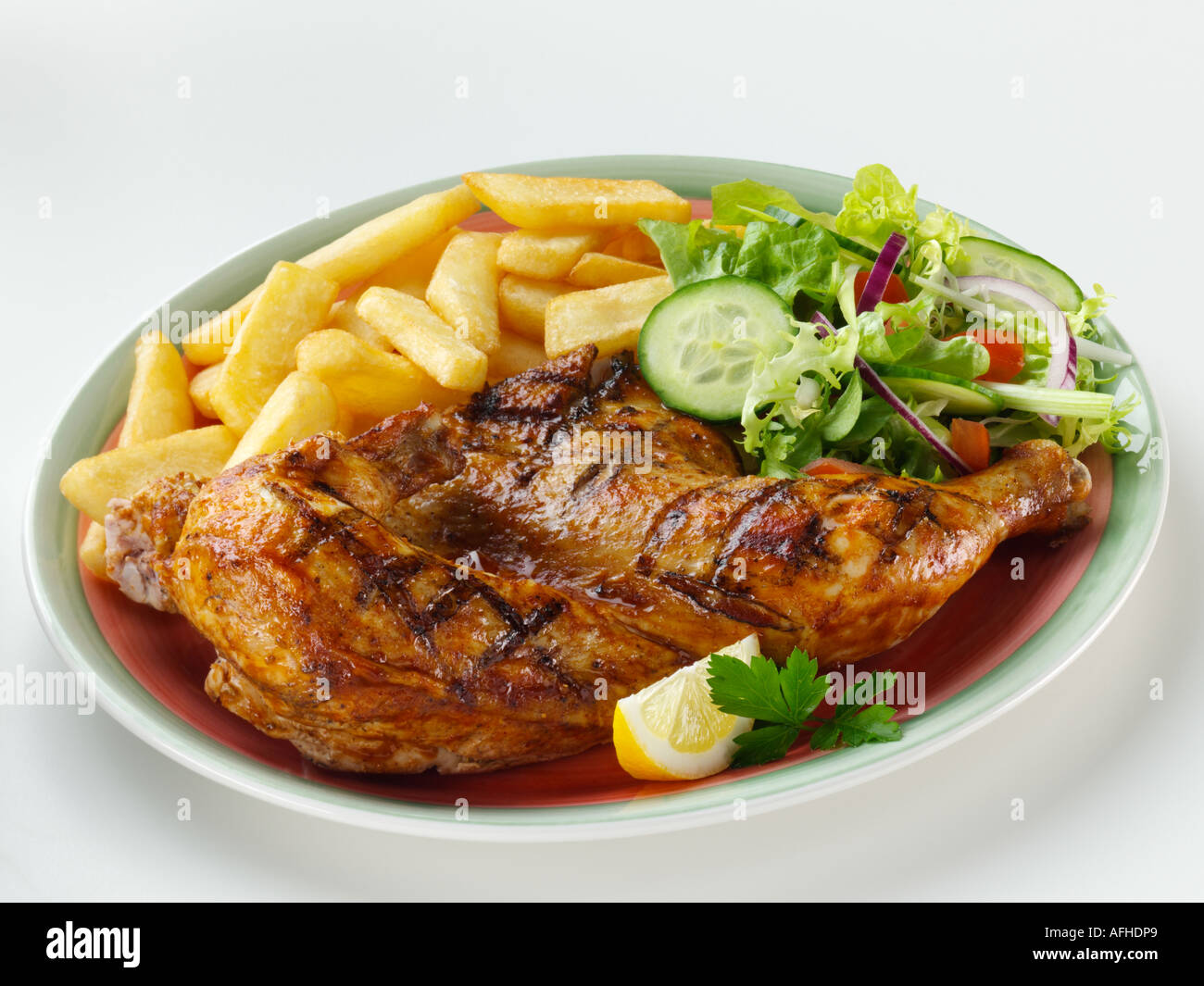 Half chicken and french fries chips Stock Photo - Alamy