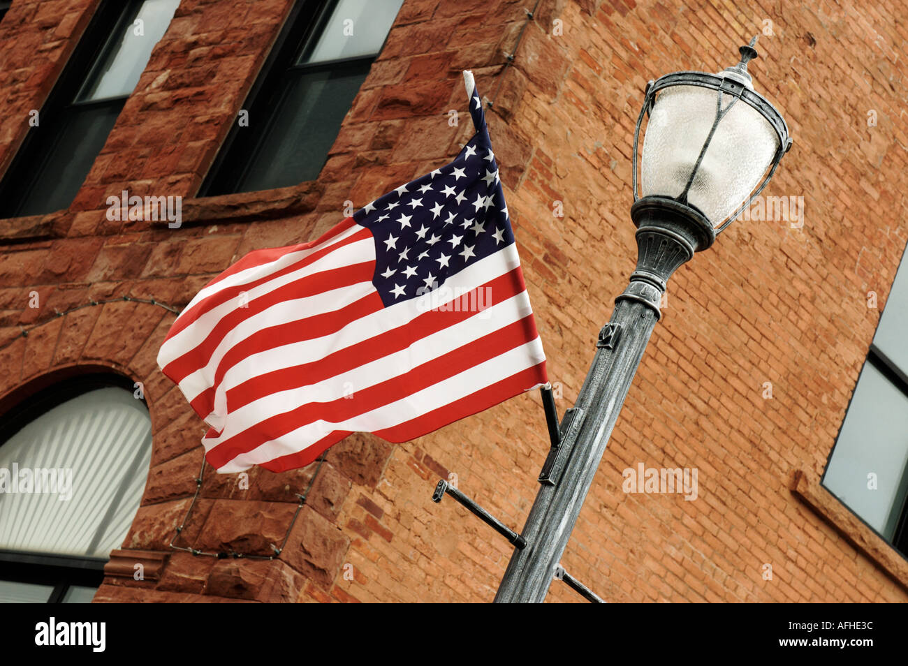 Michigan, Upper Peninsula, Flag on Lamppost Stock Photo - Alamy