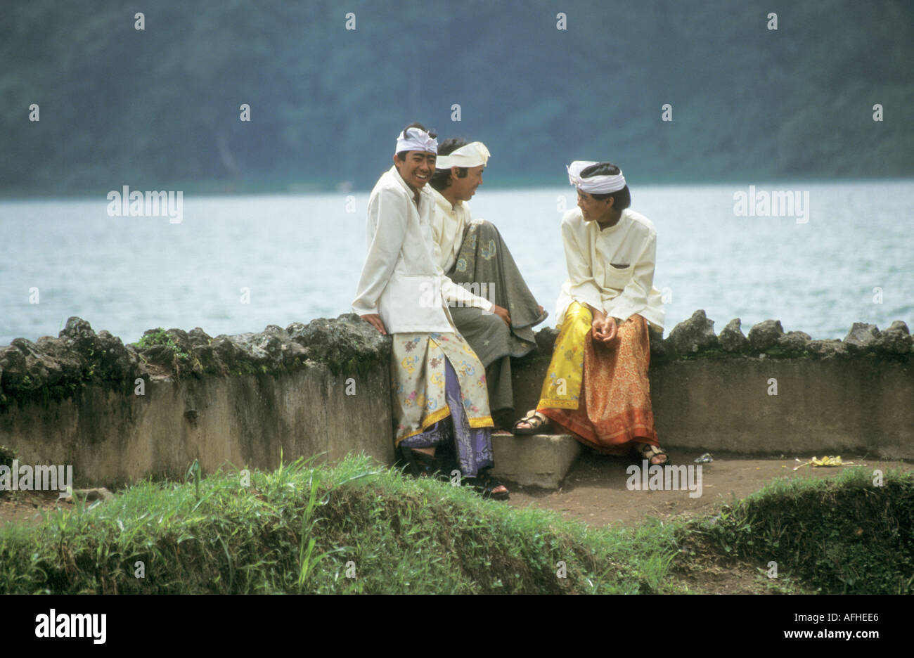 Bali Men Sitting And Talking Indonesia Stock Photo - Alamy