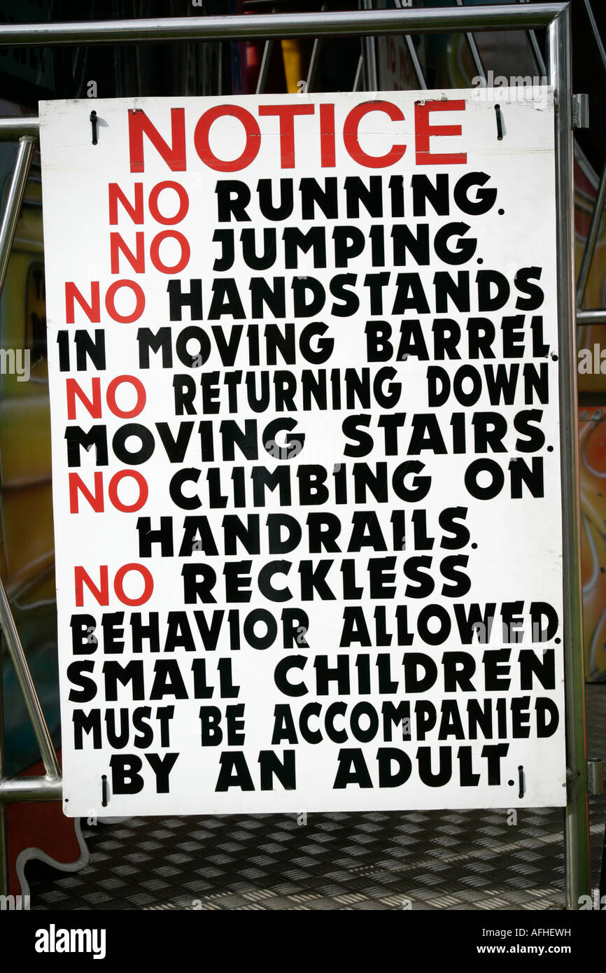 Safety notice on a fairground ride, England UK Stock Photo - Alamy