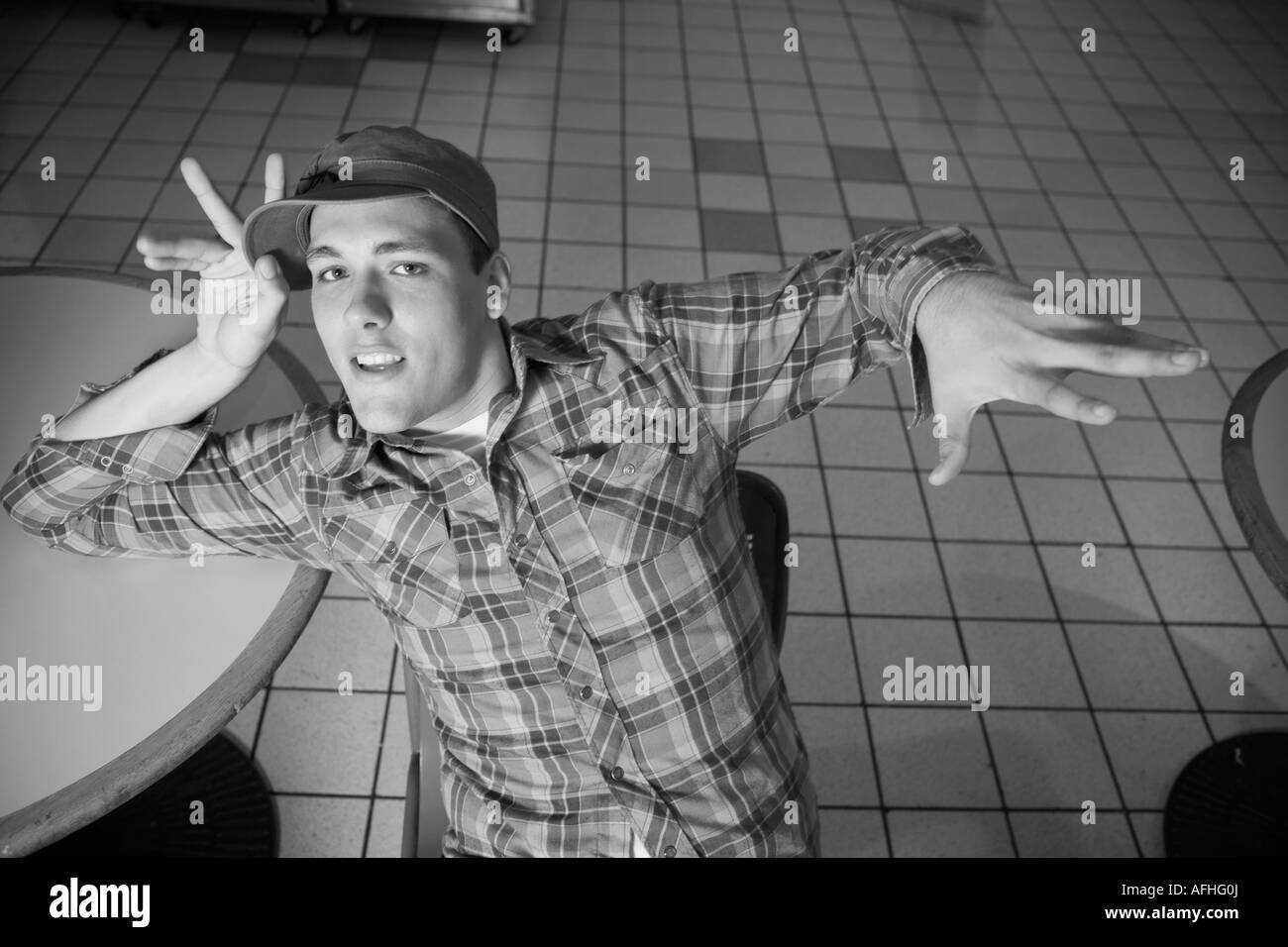 Man waiting in front Black and White Stock Photos & Images - Alamy