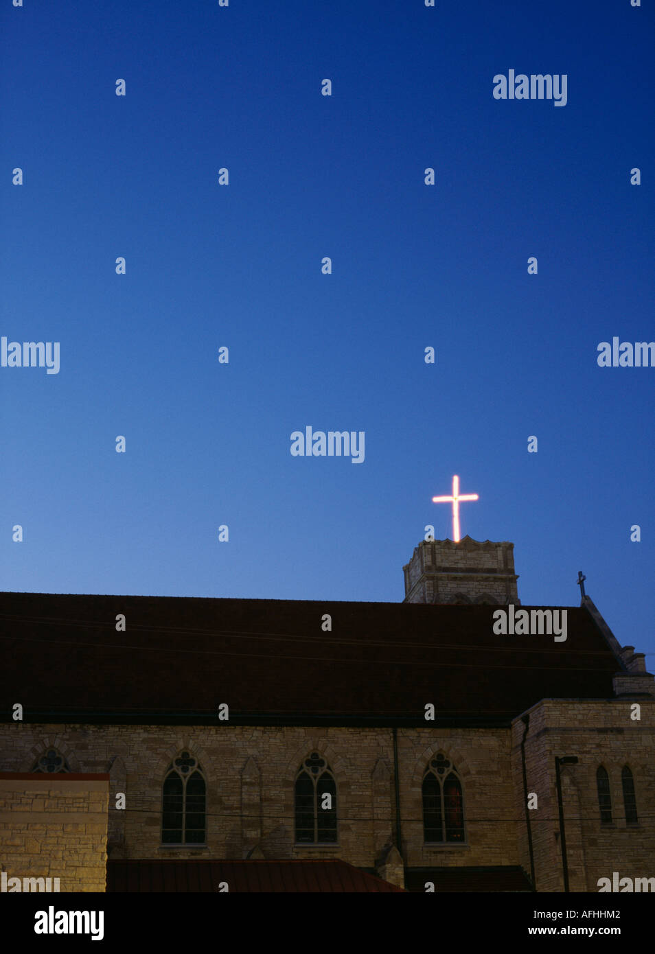 Neon cross on top of church Stock Photo - Alamy