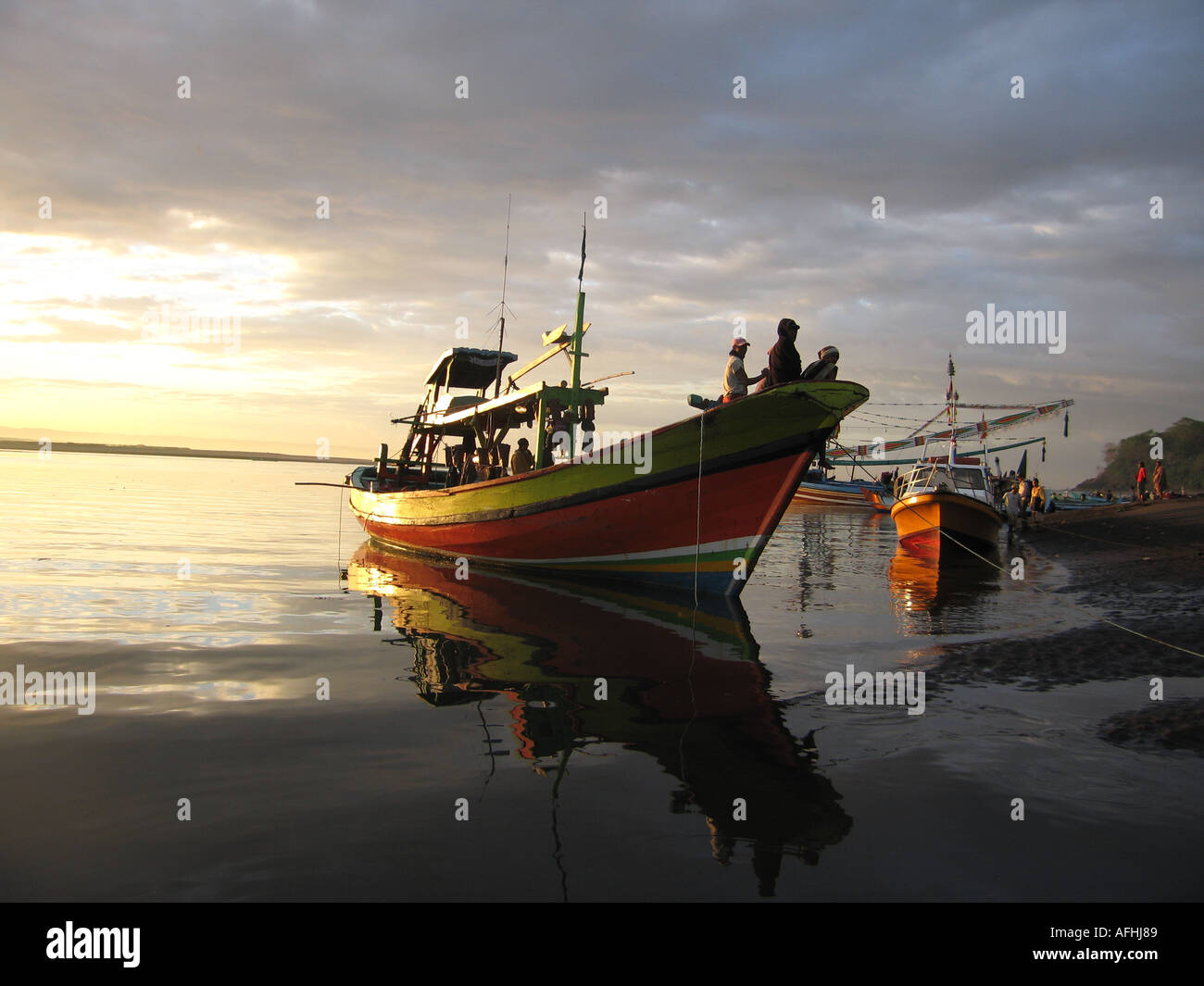 Fishermen at sunrise in Grajagan Bay Java Indonesia Stock Photo - Alamy