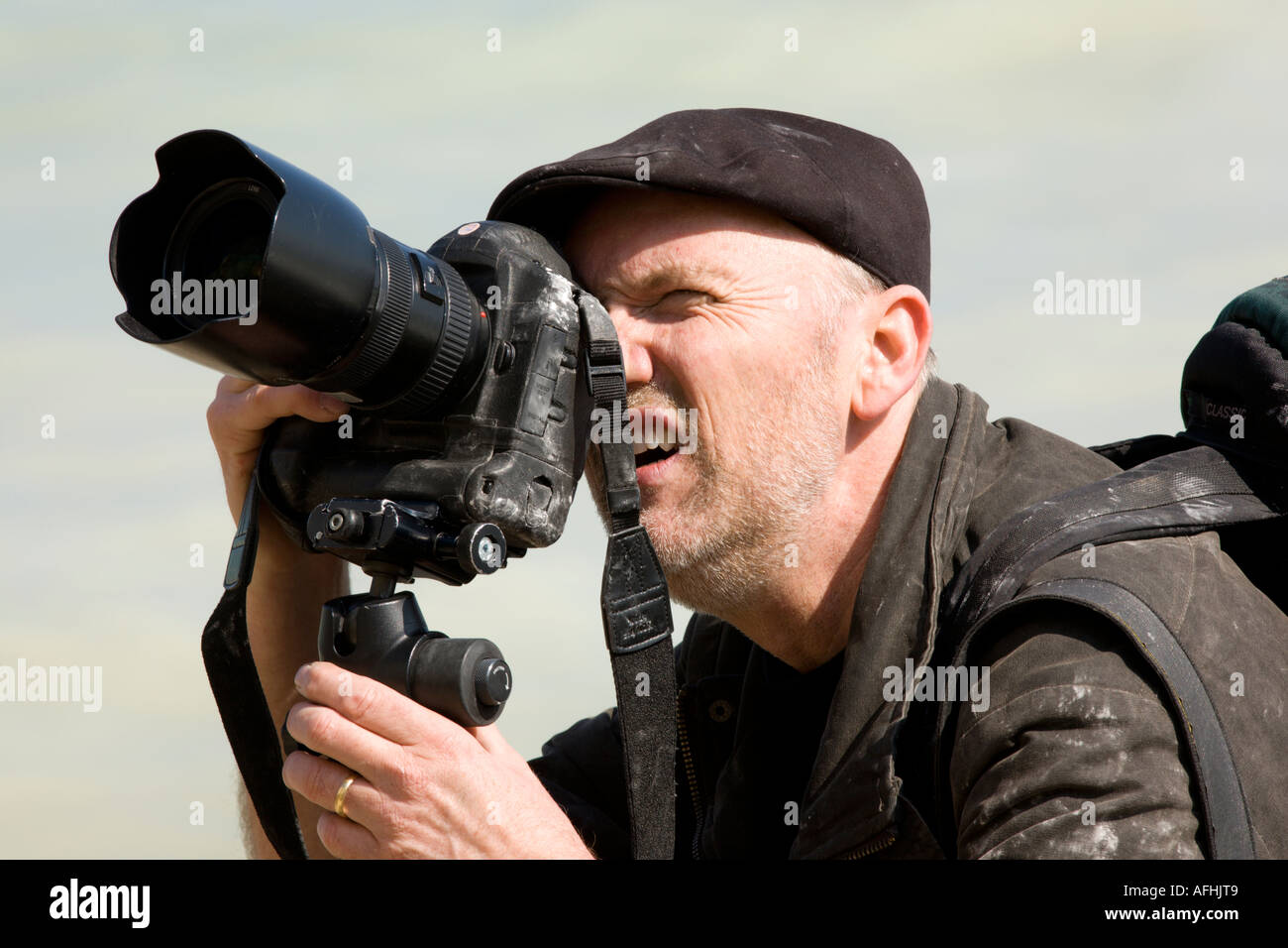 Photographer in action Stock Photo - Alamy