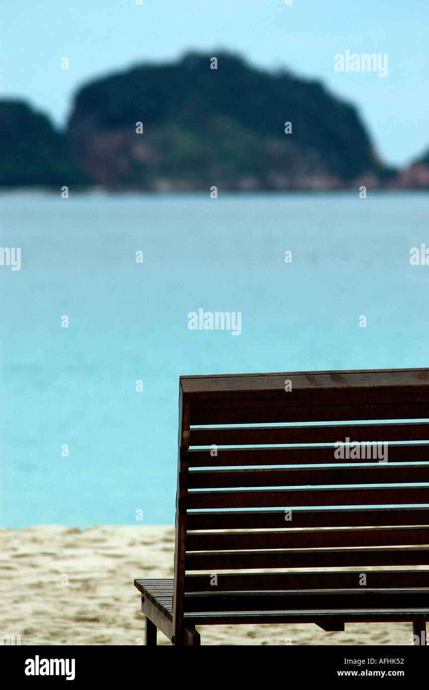 Sliding wooden bench by beach Stock Photo - Alamy