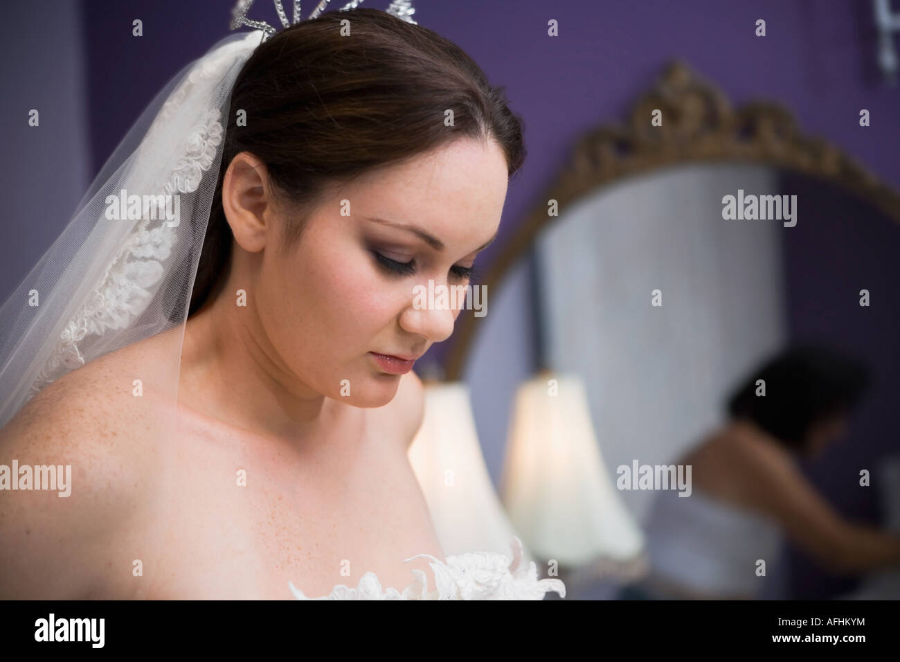 Bride getting ready with help from her mother Stock Photo - Alamy
