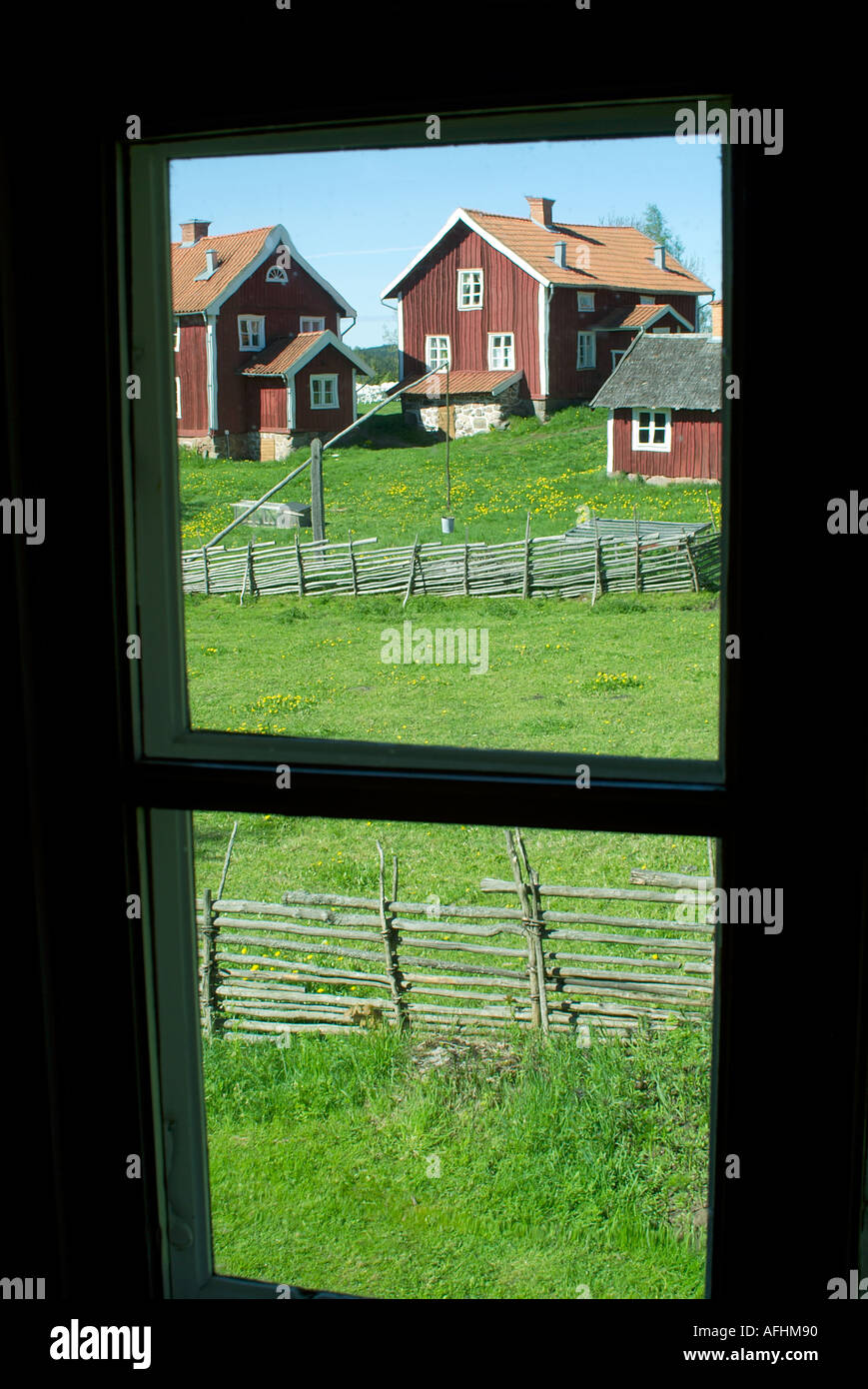 Window view against farmhouse Sweden Stock Photo - Alamy