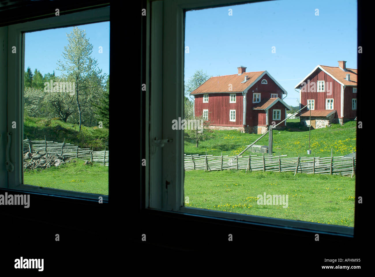Window view against farmhouse Sweden Stock Photo - Alamy