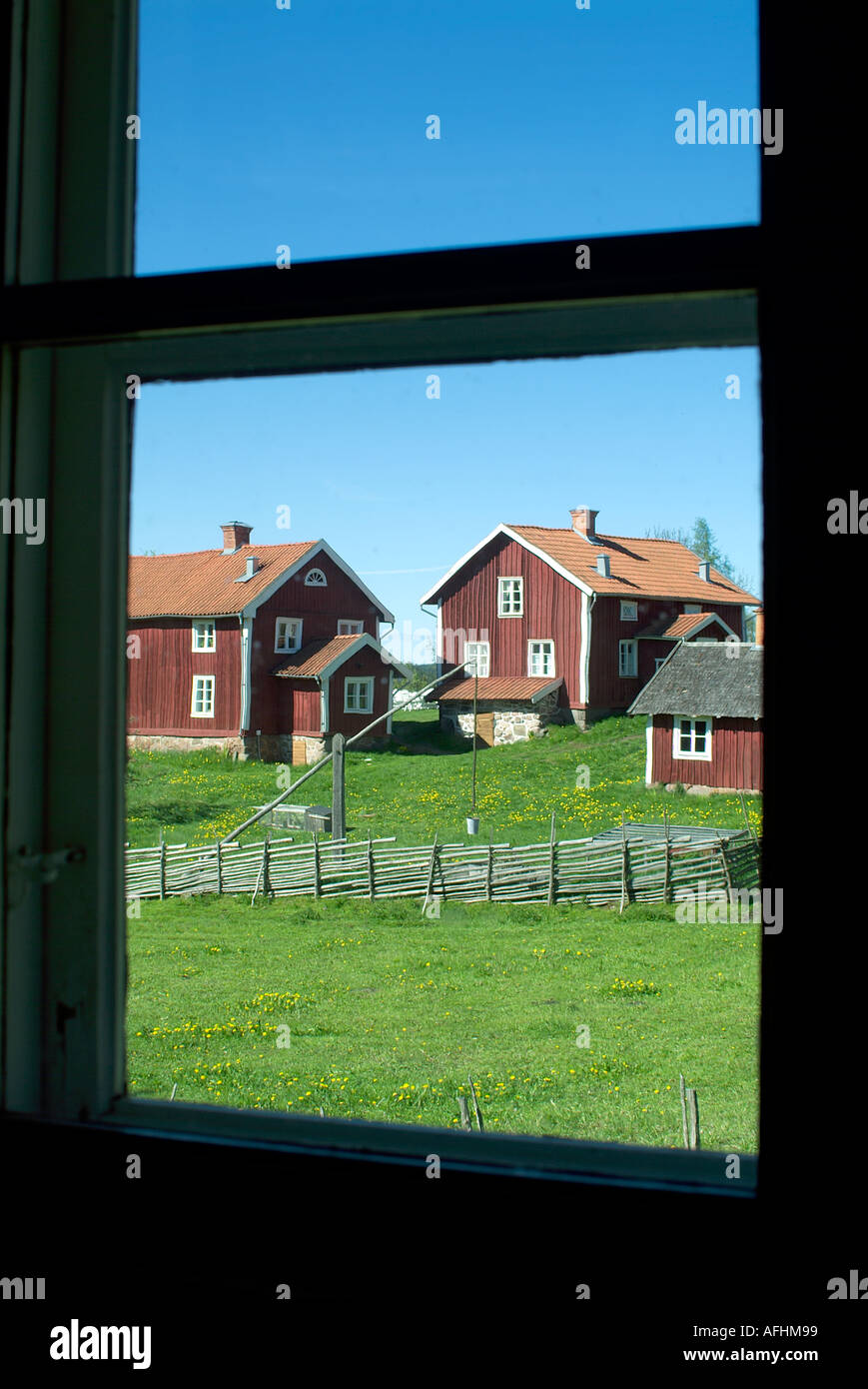 Window view against farmhouse Sweden Stock Photo - Alamy
