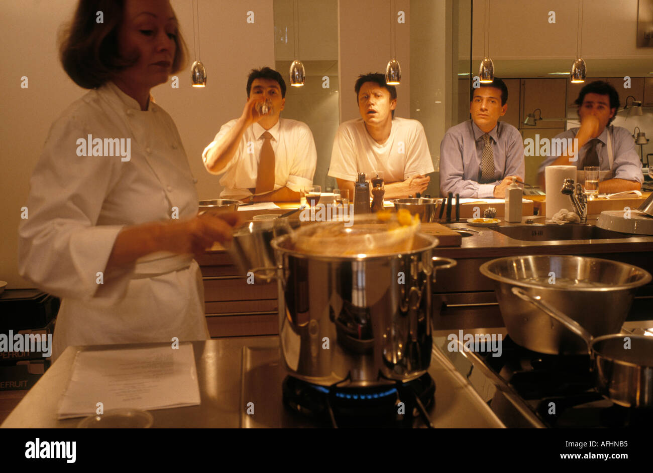 Single men learn the skills of cooking during cookery lessons classes ...
