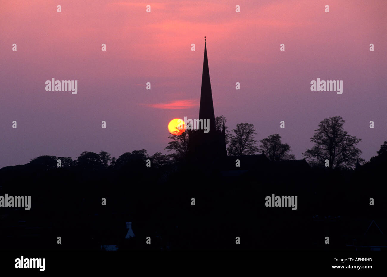 Church spire with sunset Stock Photo - Alamy