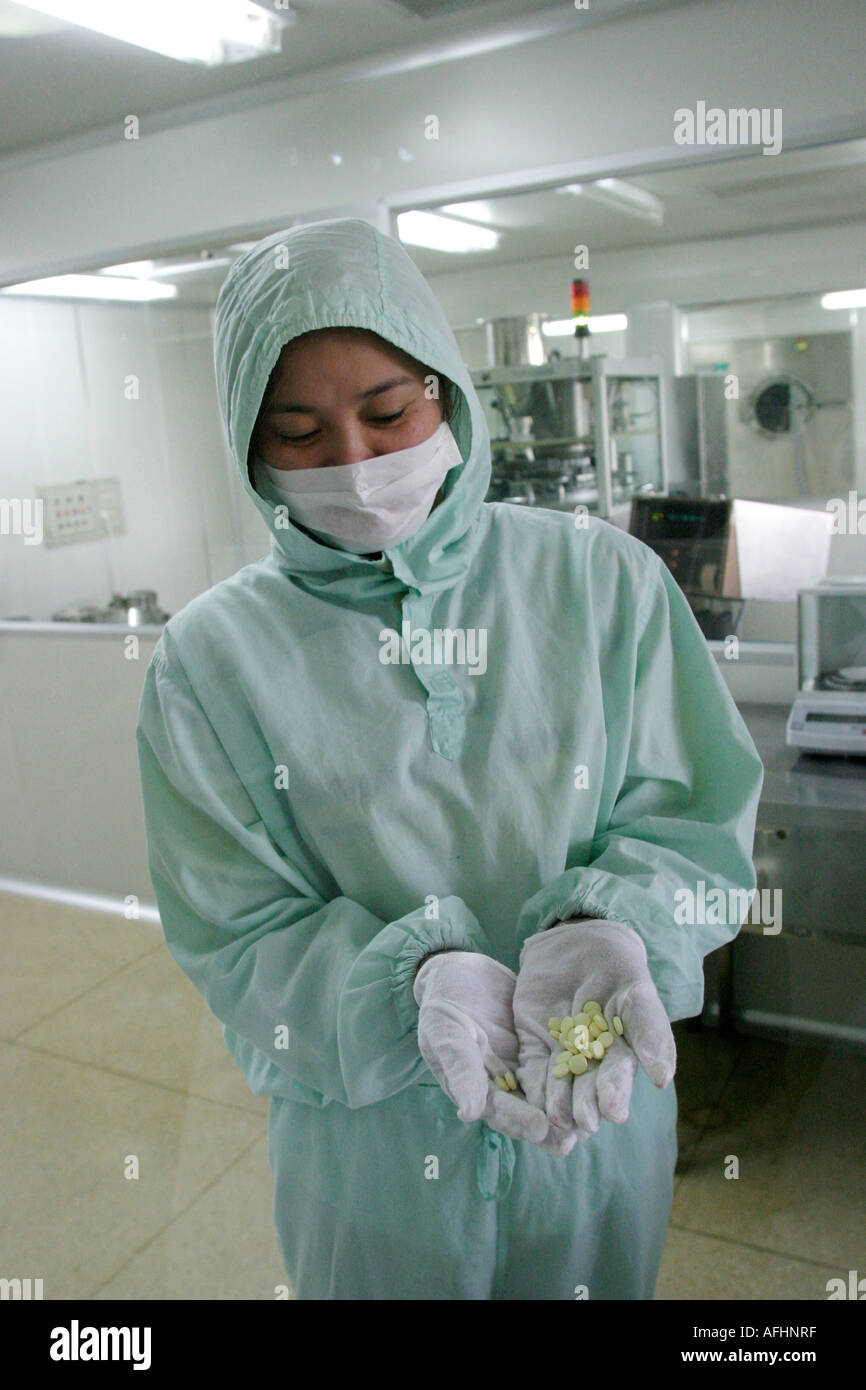 Workers wearing full overalls Stock Photo - Alamy