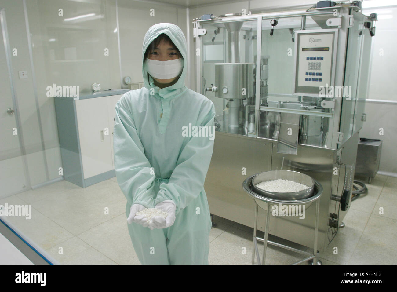 Workers wearing full overalls Stock Photo - Alamy