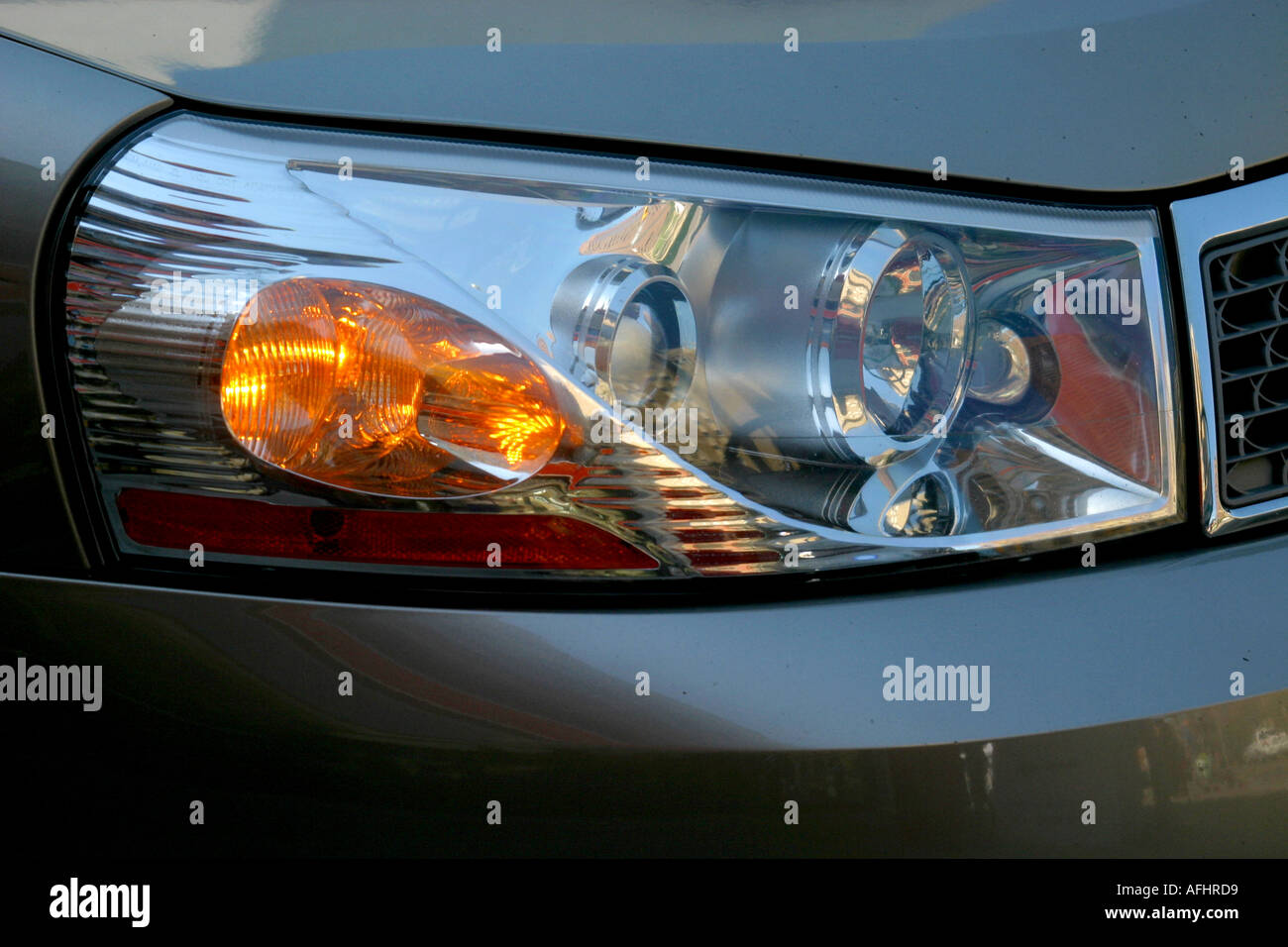 Unusual headlight on a new vehicle Stock Photo - Alamy