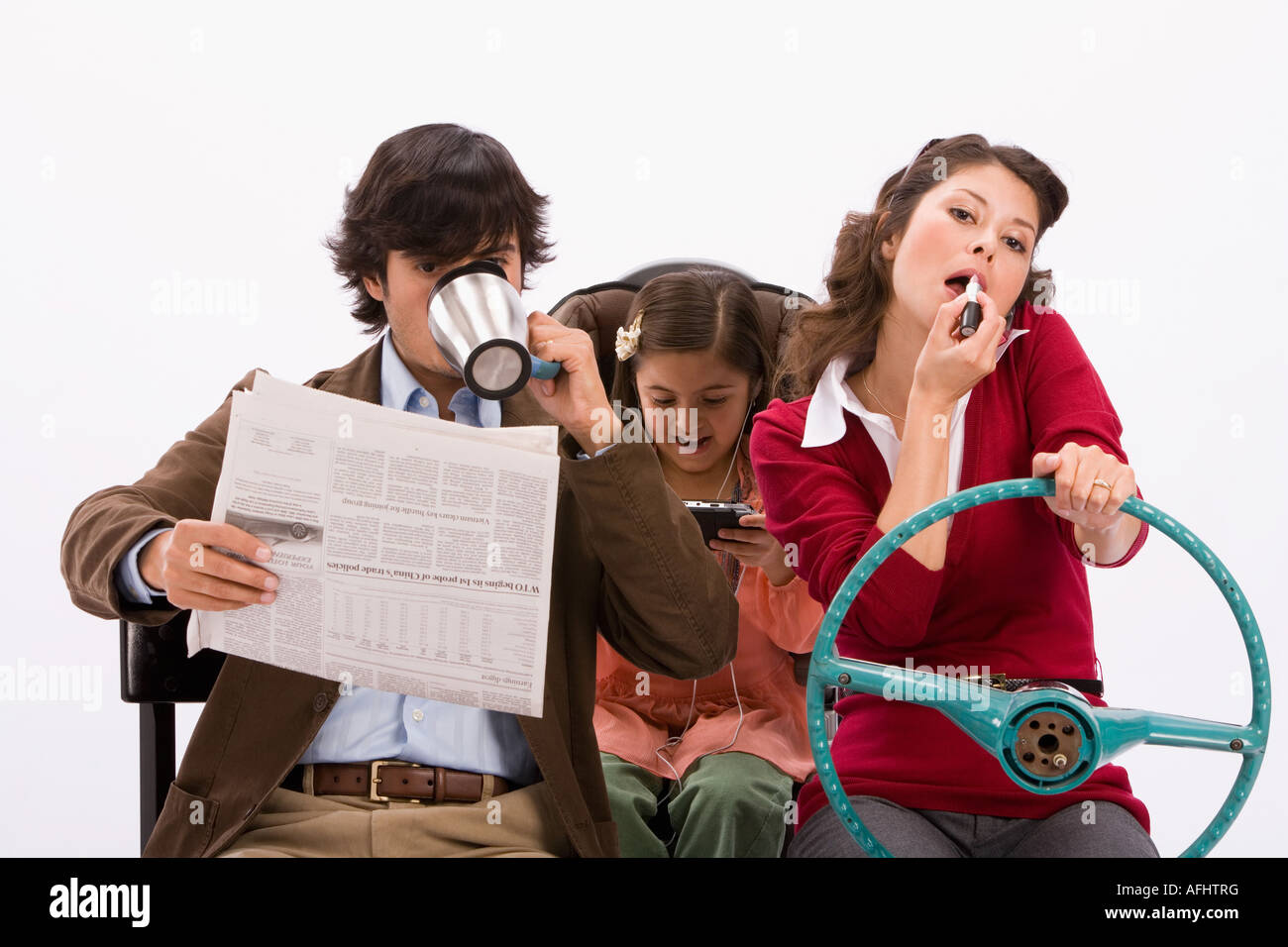 Distracted family in imaginary car Stock Photo - Alamy
