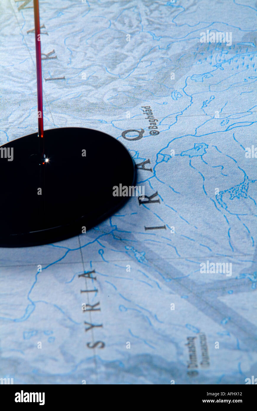Oil pouring over map of IRAQ and Middle East Stock Photo - Alamy