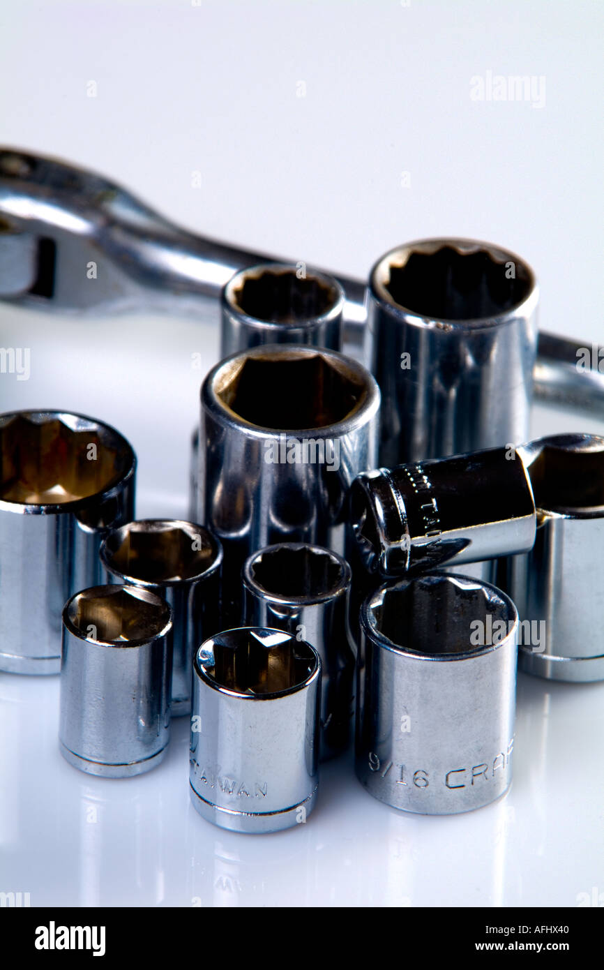 Socket wrench and sockets on white background Stock Photo - Alamy