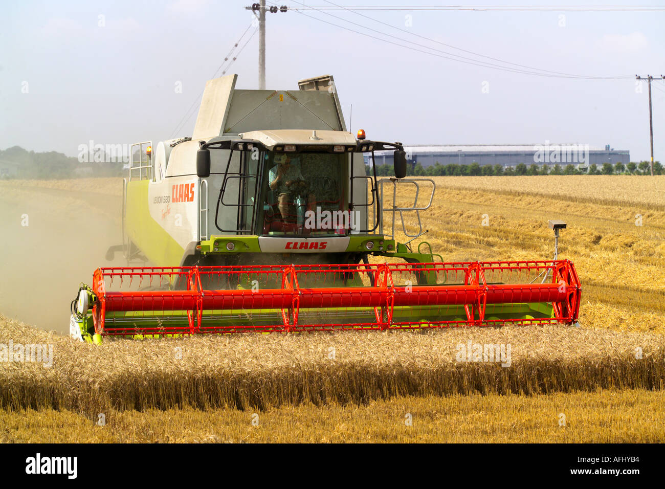 Harvesting the wheat Claas lexion 580 terra trac combine harvester ...