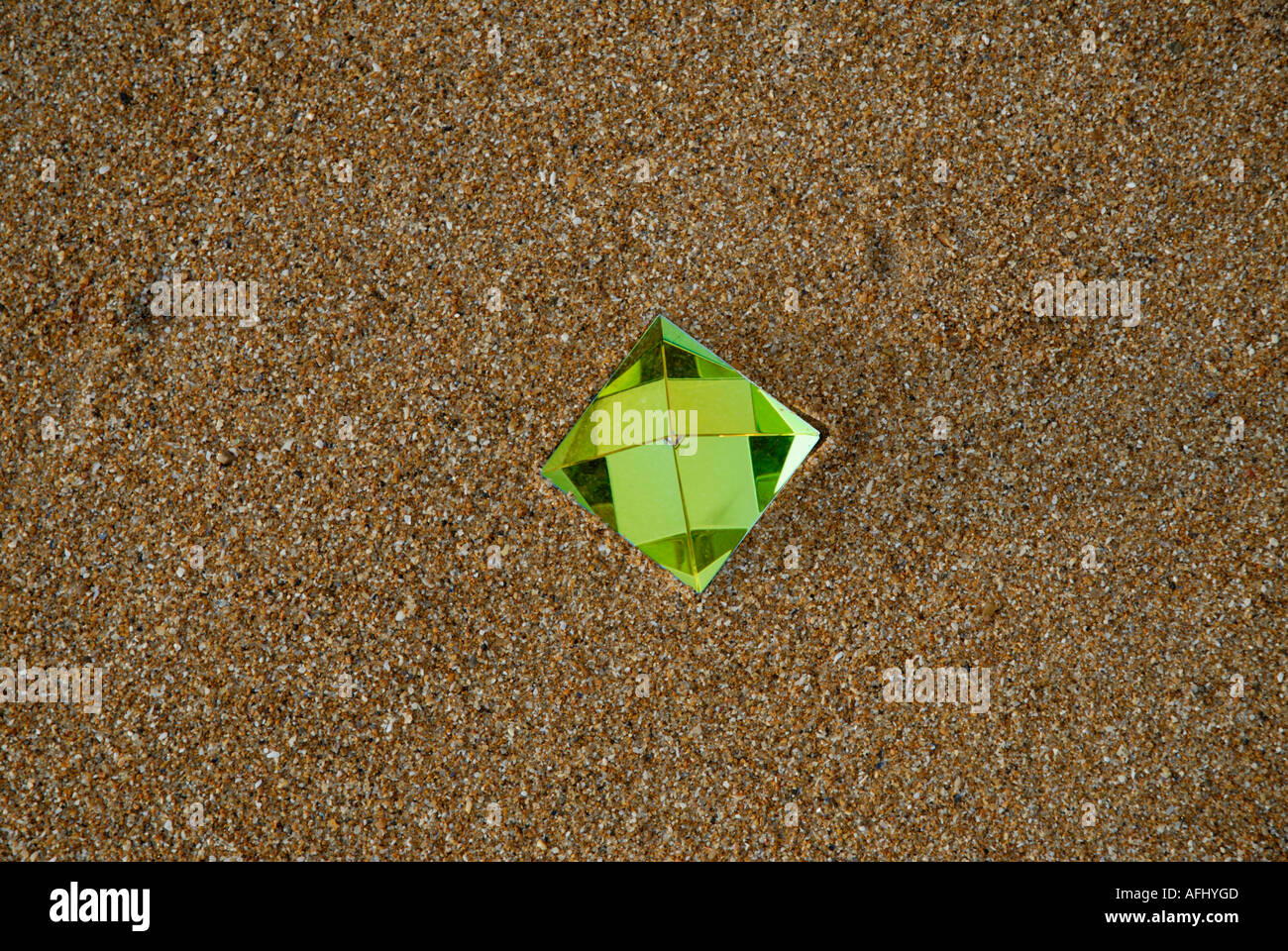 Glass pyramid prism on the seashore Stock Photo - Alamy