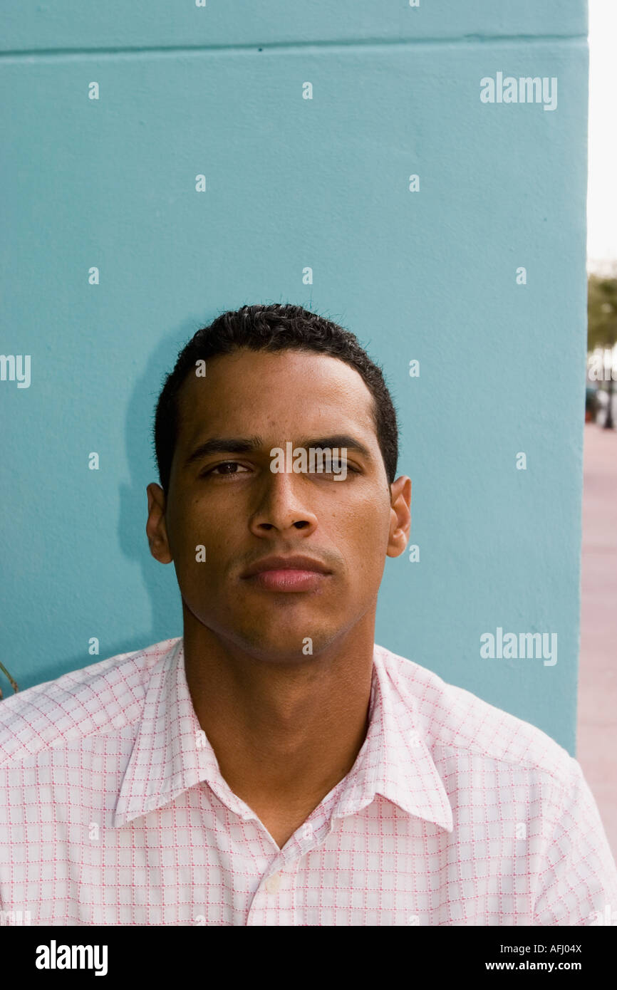 Young man looking serious Stock Photo - Alamy
