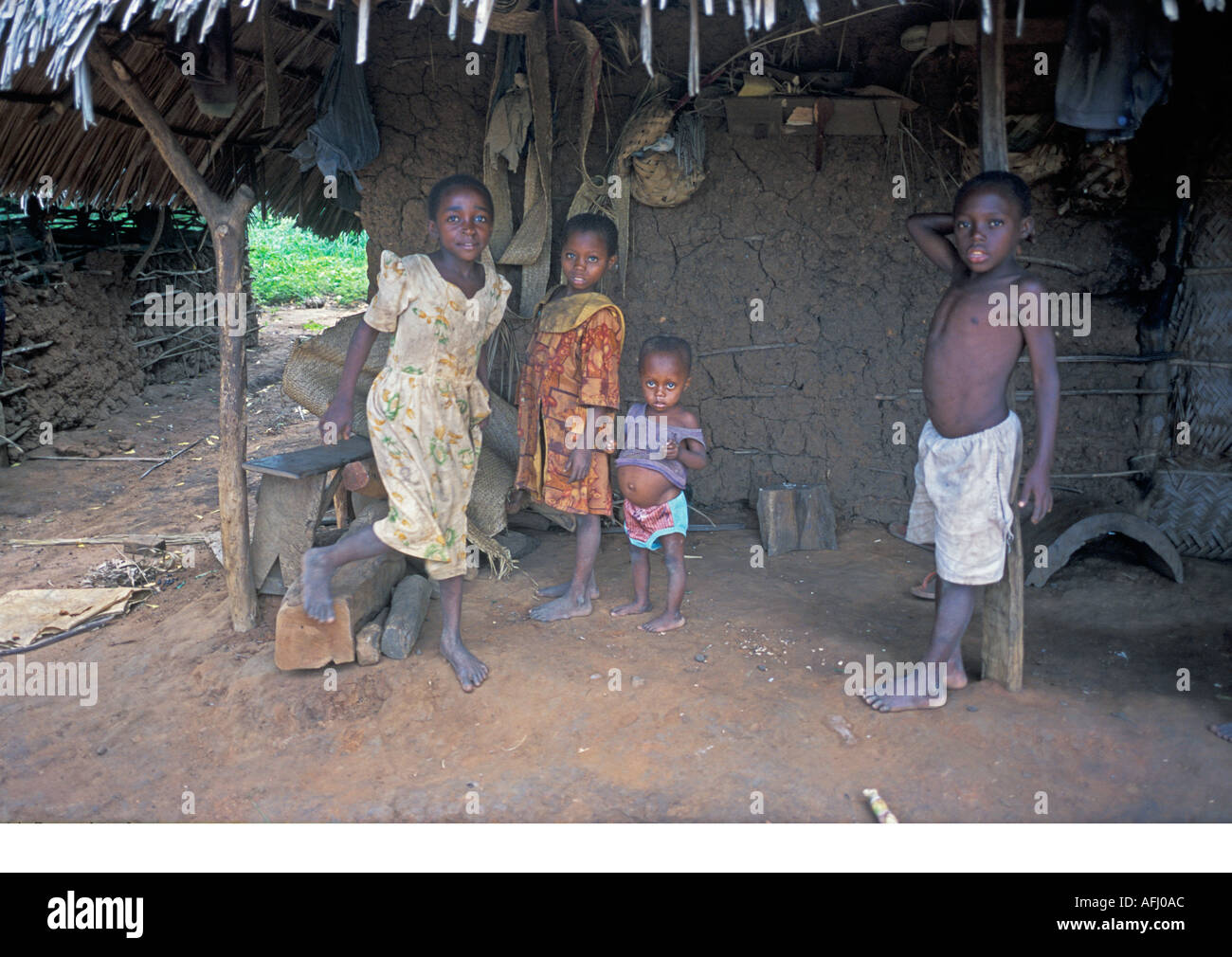 AFRICA KENYA DIGO Obviously malnourished children play in front of ...