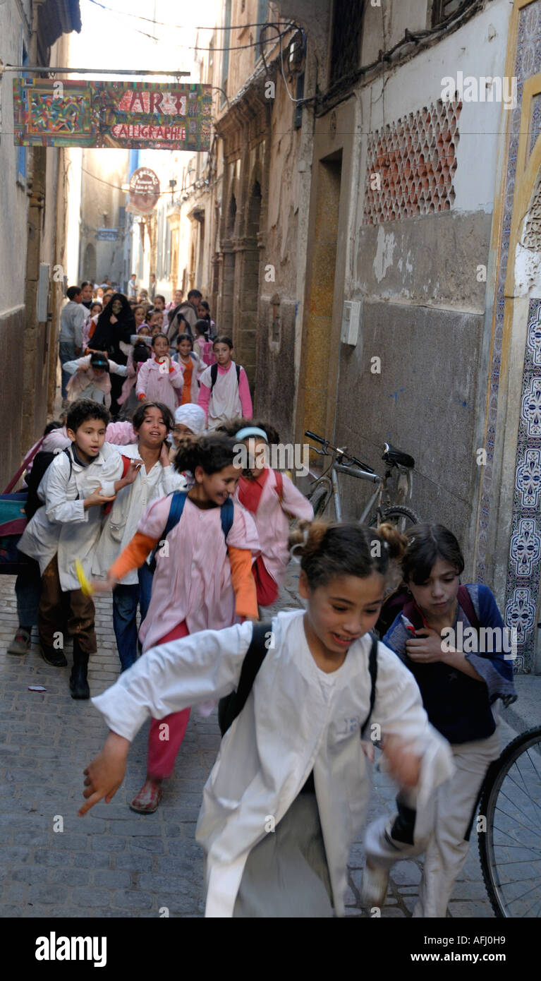 Children running rushing leaving school Essaouira Morocco North Africa ...