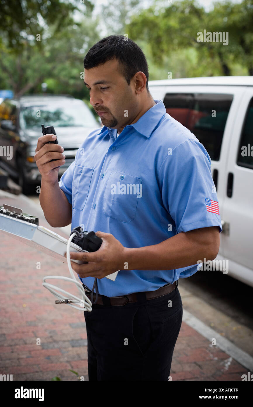 Cable man working outdoors Stock Photo - Alamy