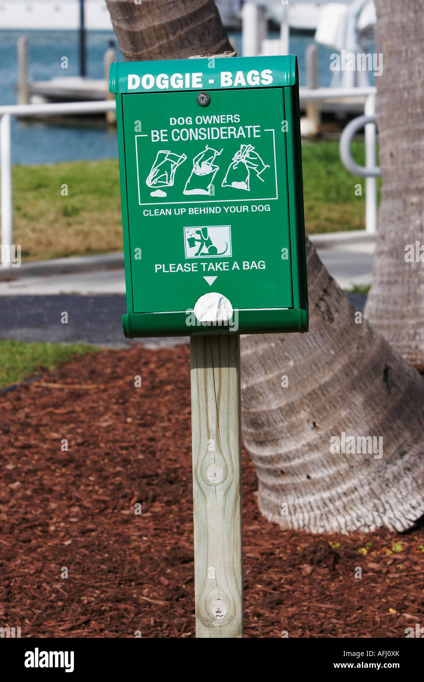 Doggie bag signs in park Stock Photo - Alamy
