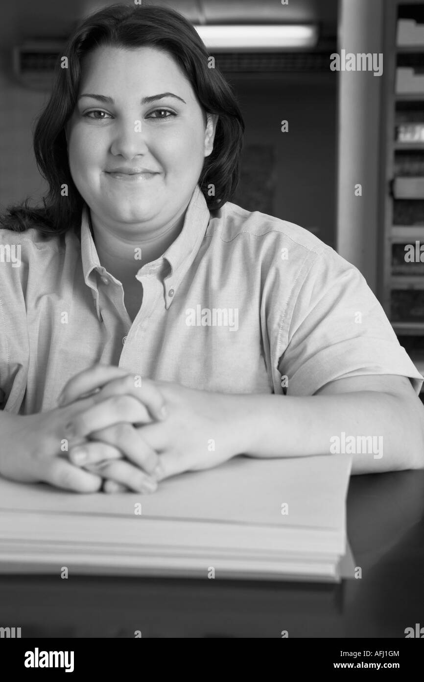 Young woman working in copy center Stock Photo - Alamy