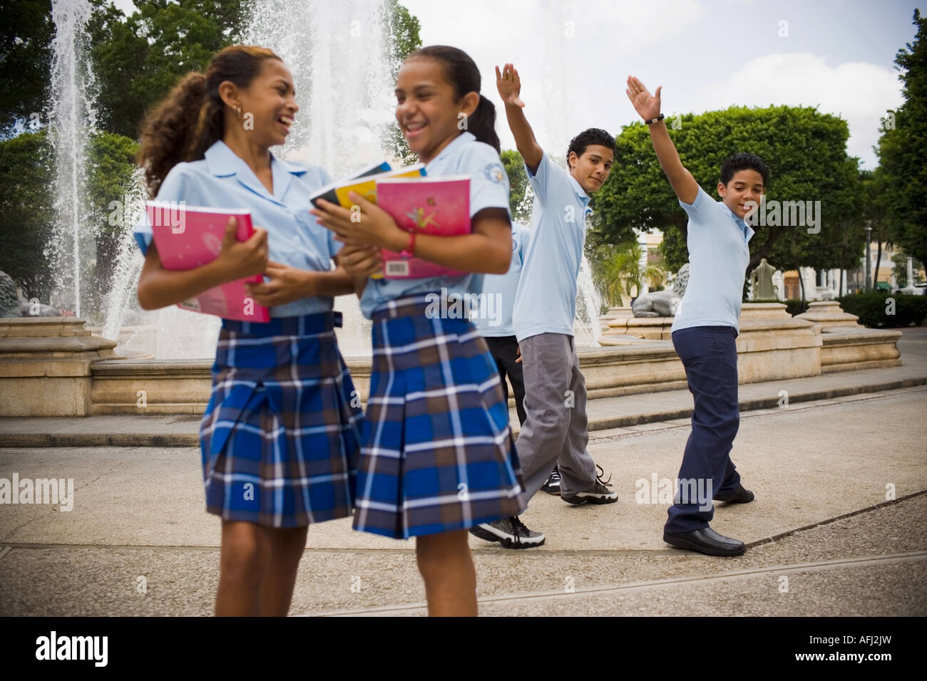 School children socializing in center plaza Stock Photo - Alamy